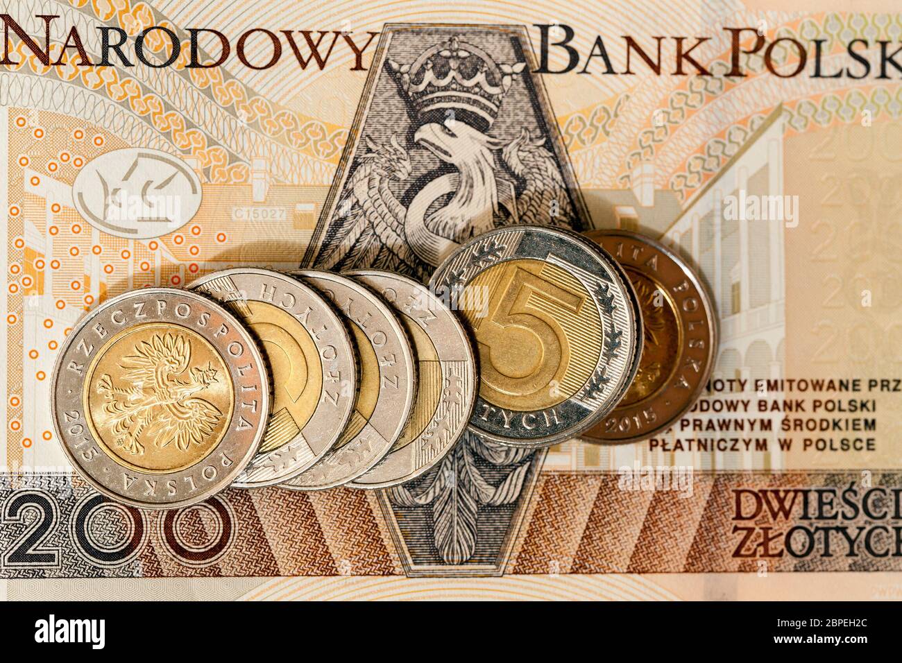 photographed close-up Polish coins. Zloty stacked together, shallow ...