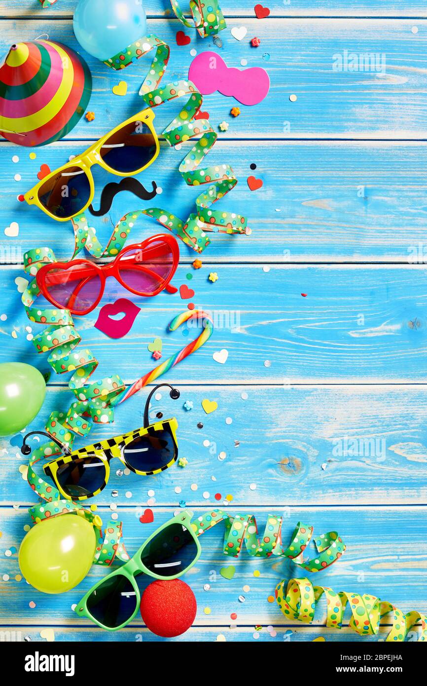 Festive party theme background on wood paneling with copy space ...