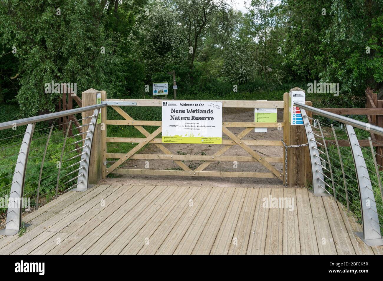 Gated entrance to the Nene Wetlands Nature Reserve, locked and chained ...