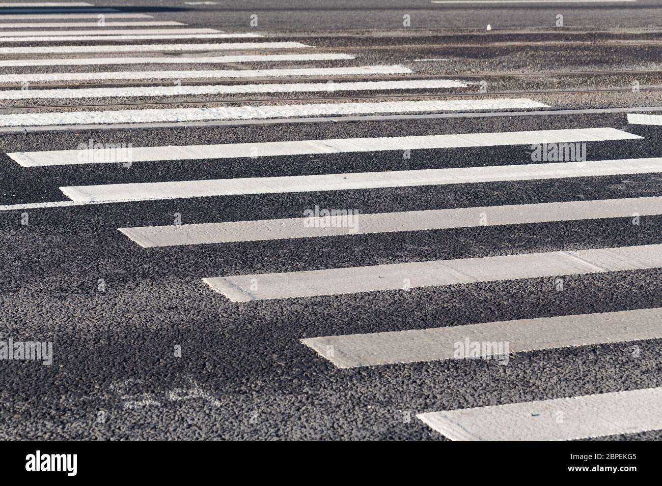 Pedestrian zebra crossing white stripes on the road Stock Photo - Alamy