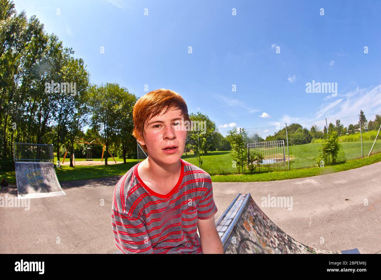 young boy sweating and exhausted from sports Stock Photo - Alamy