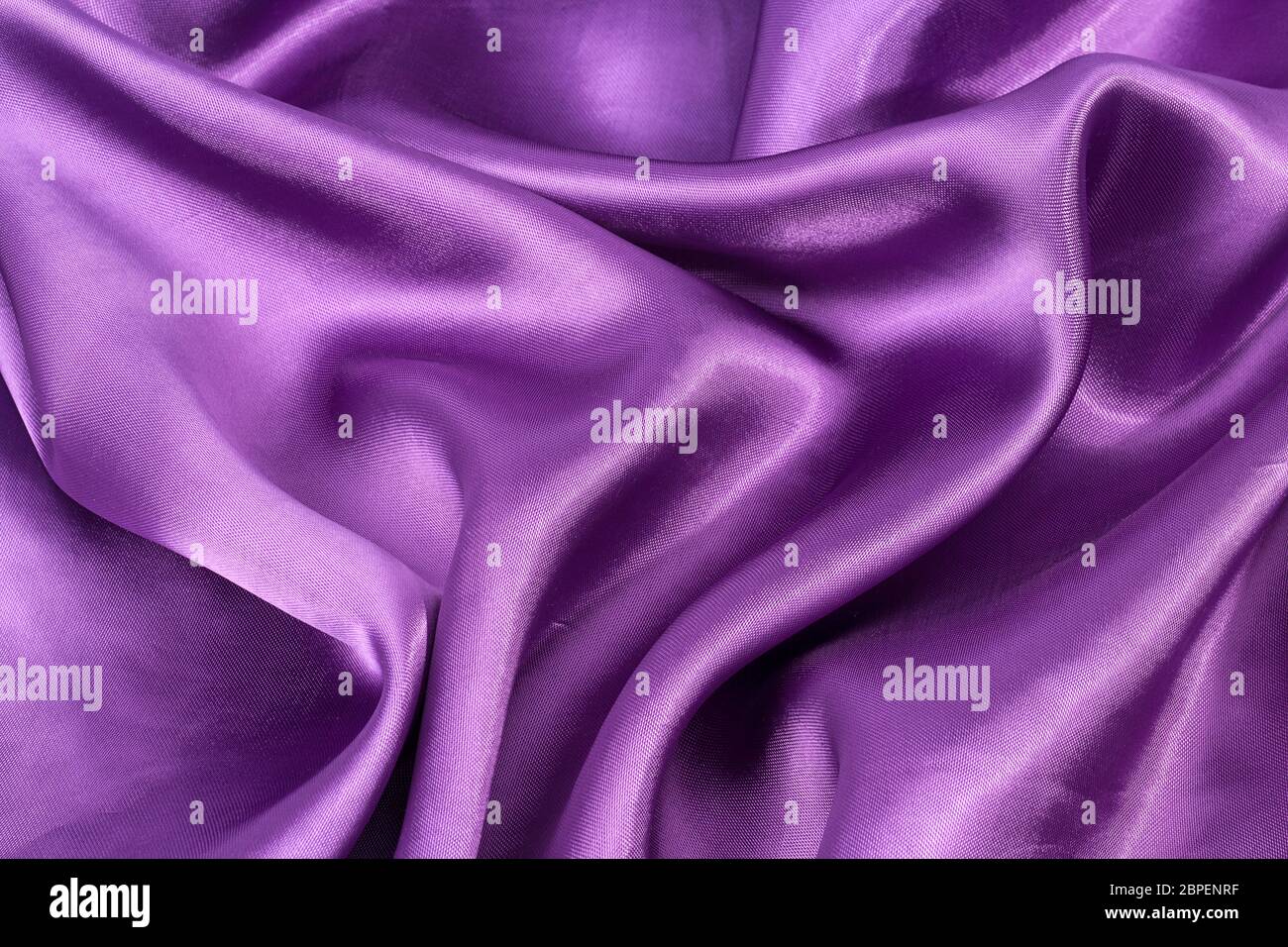 Silk background, texture of violet shiny fabric, close up Stock Photo ...