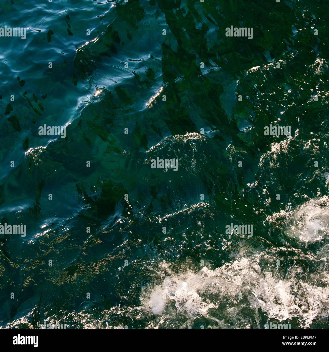 dark surface of sea water and waves. View from above Stock Photo - Alamy