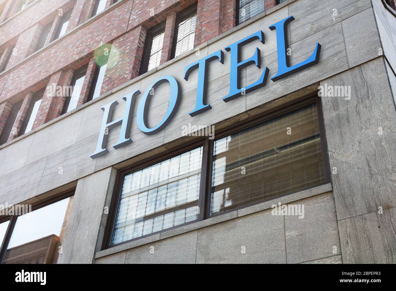 Low angle view of modern hotel building in city Stock Photo - Alamy