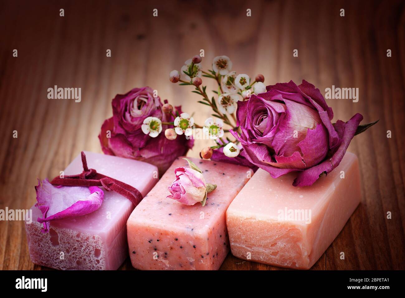 Still life with aroma soaps on rustic wood for wellness and beauty ...