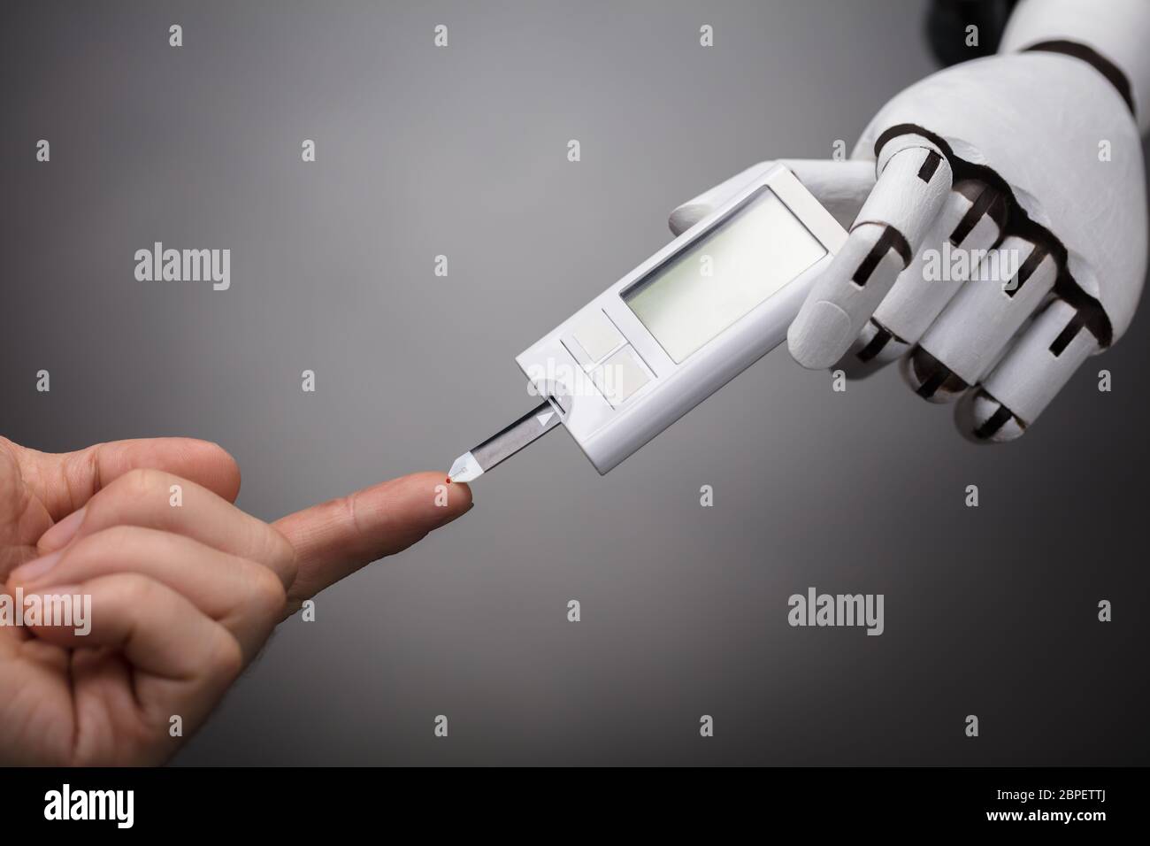 Robot Checking Person's Sugar Level With Glucometer On Grey Background ...