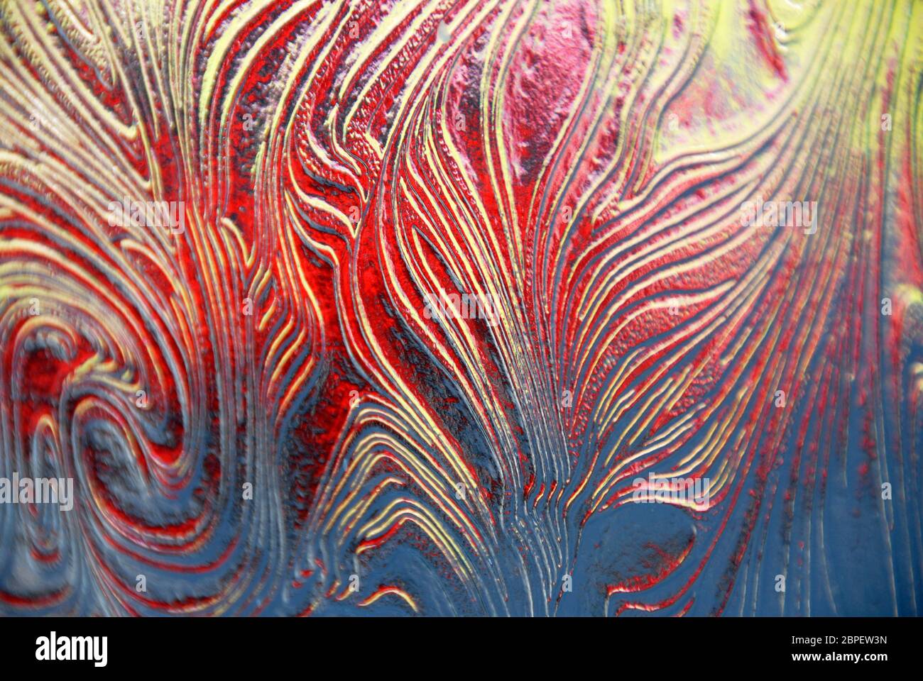 Abstract from lookng at red object through translucent glassin window ...