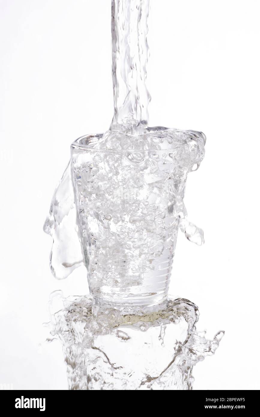 Overflowing Glass Of Water