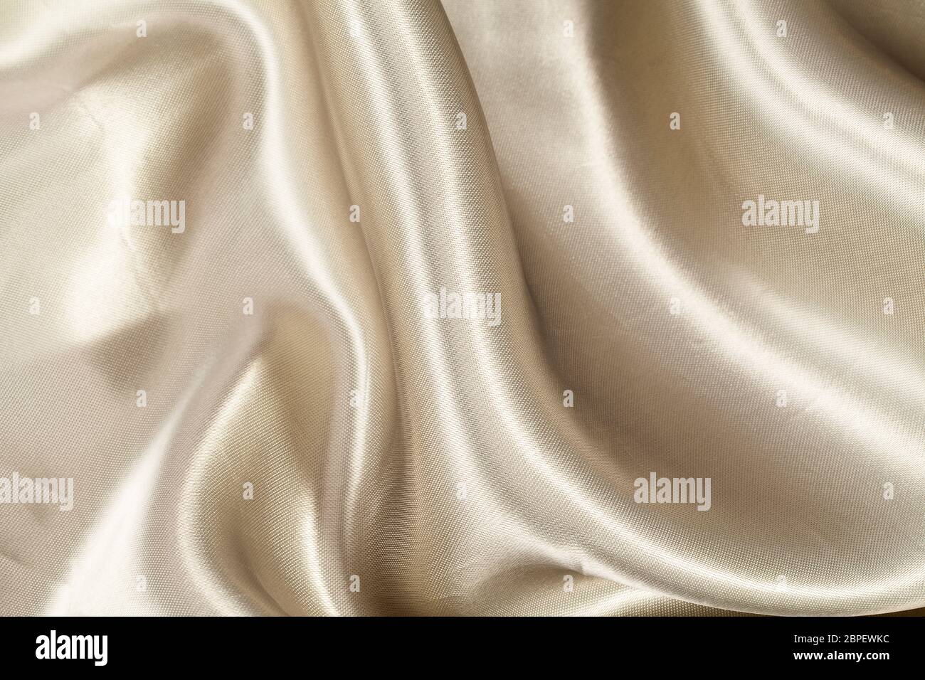 Silk background, texture of beige shiny fabric, close up Stock Photo ...