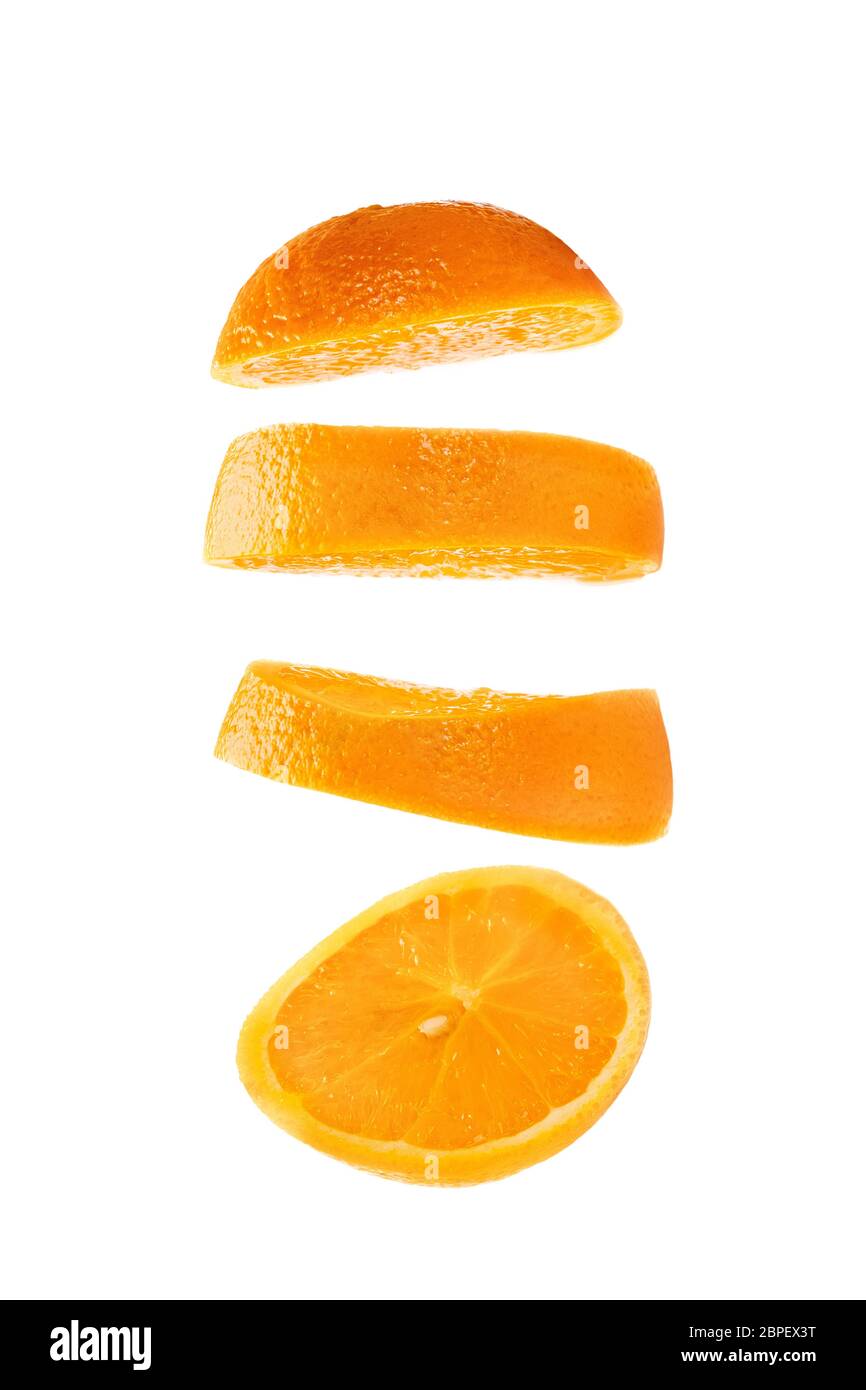 Sliced orange floating on white background. Fruit slice falling on ...
