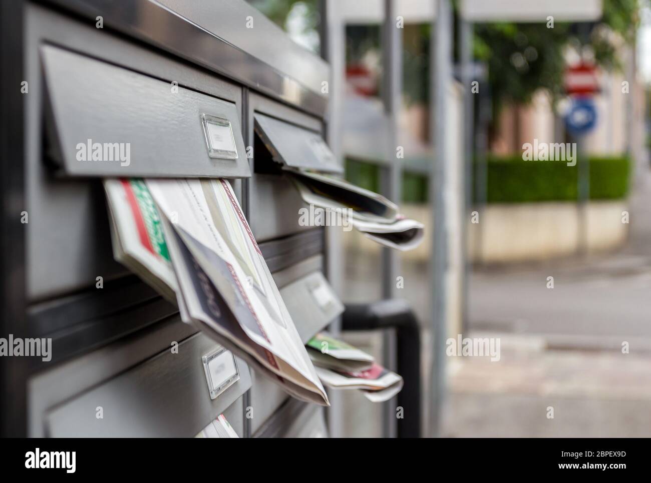 Advertising in the mail box. Defocused blurry background Stock Photo ...