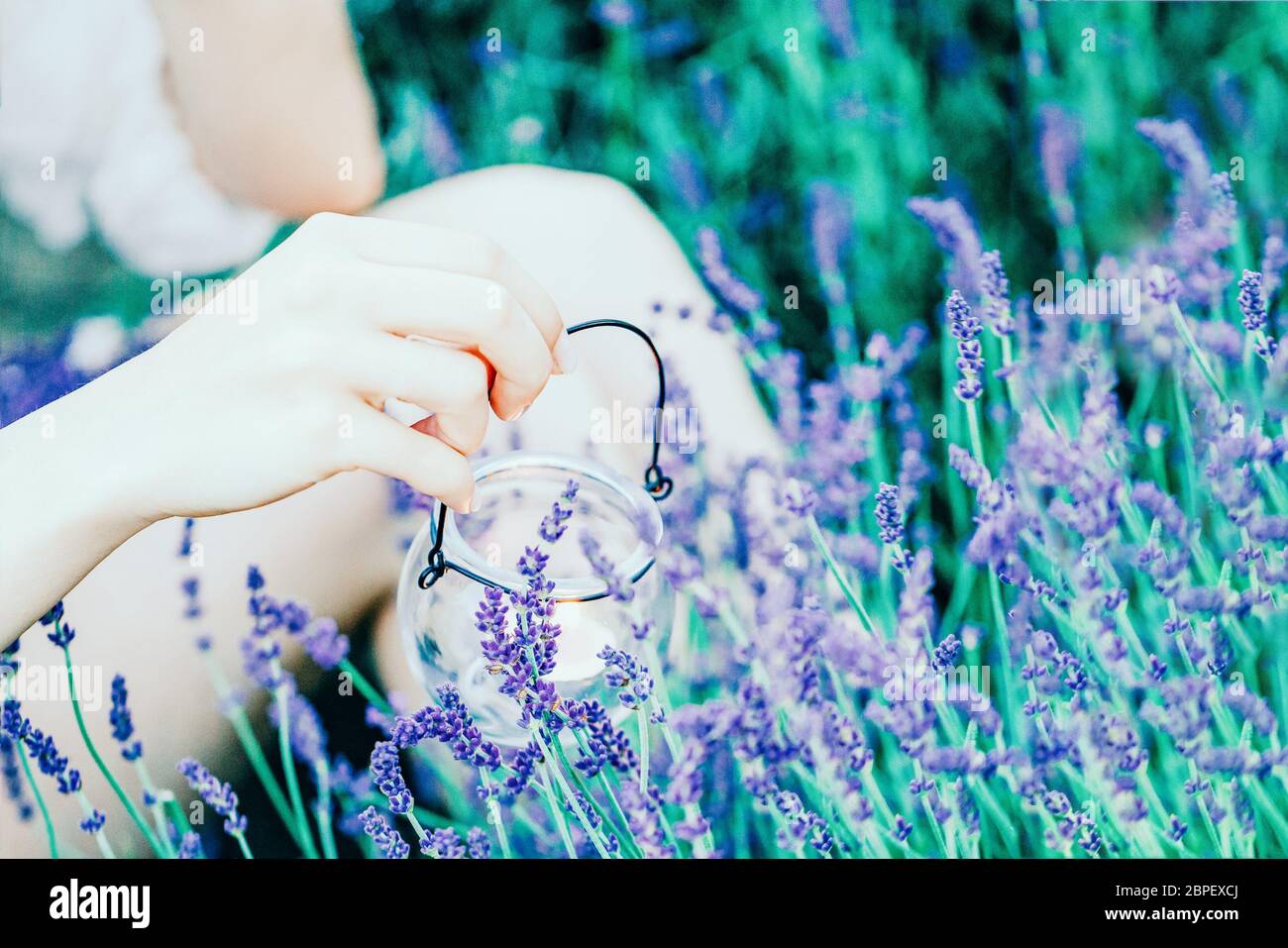Hand holding candle holder hi-res stock photography and images - Alamy