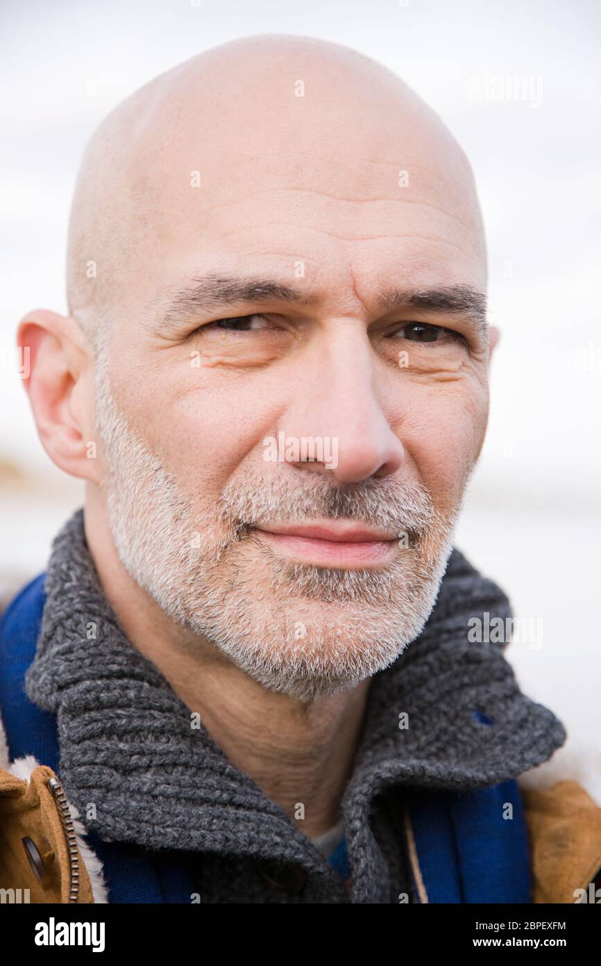 Headshot of a bald man Stock Photo - Alamy