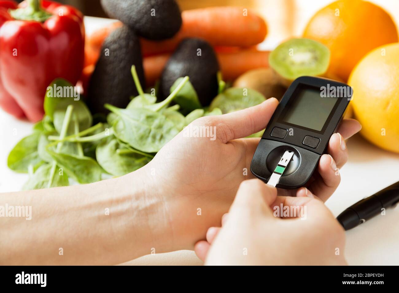 Diabetes monitor, diet and healthy food eating nutritional concept with ...