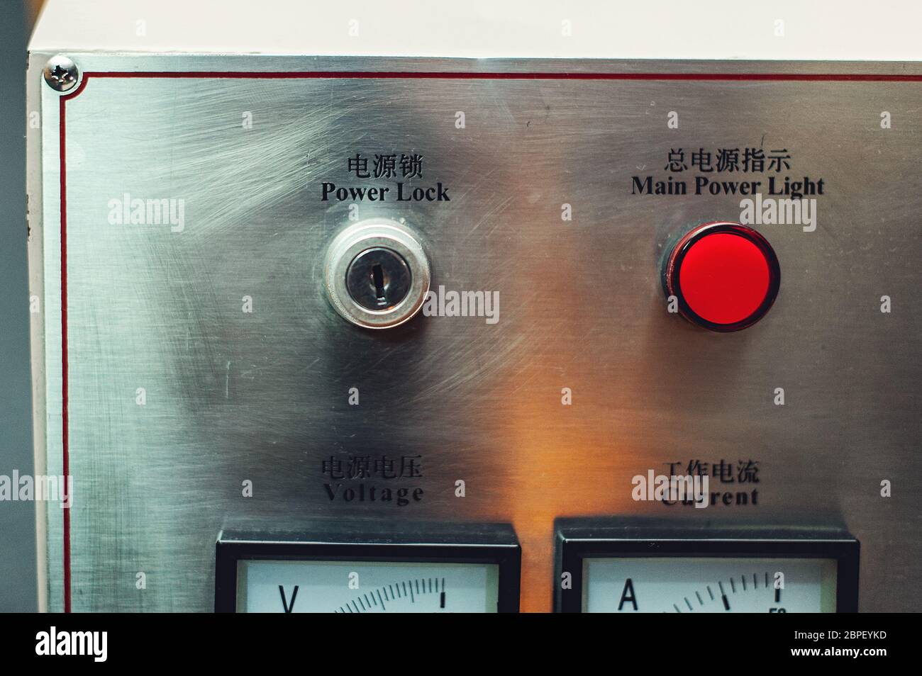 Control panel in main engine room. inscriptions in English and Chinese ...