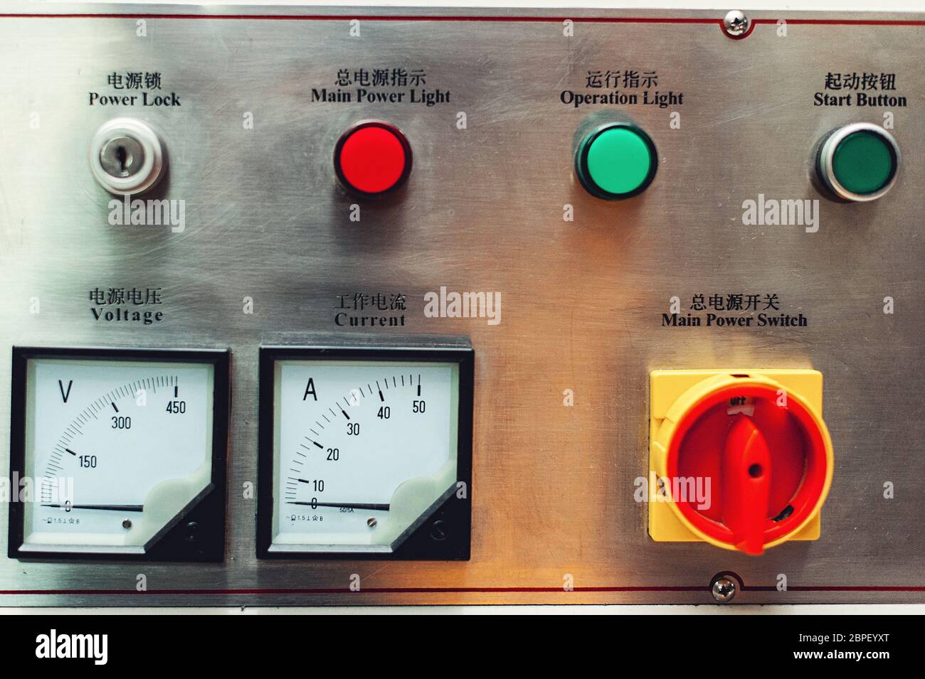 Control panel in main engine room. inscriptions in English and Chinese ...