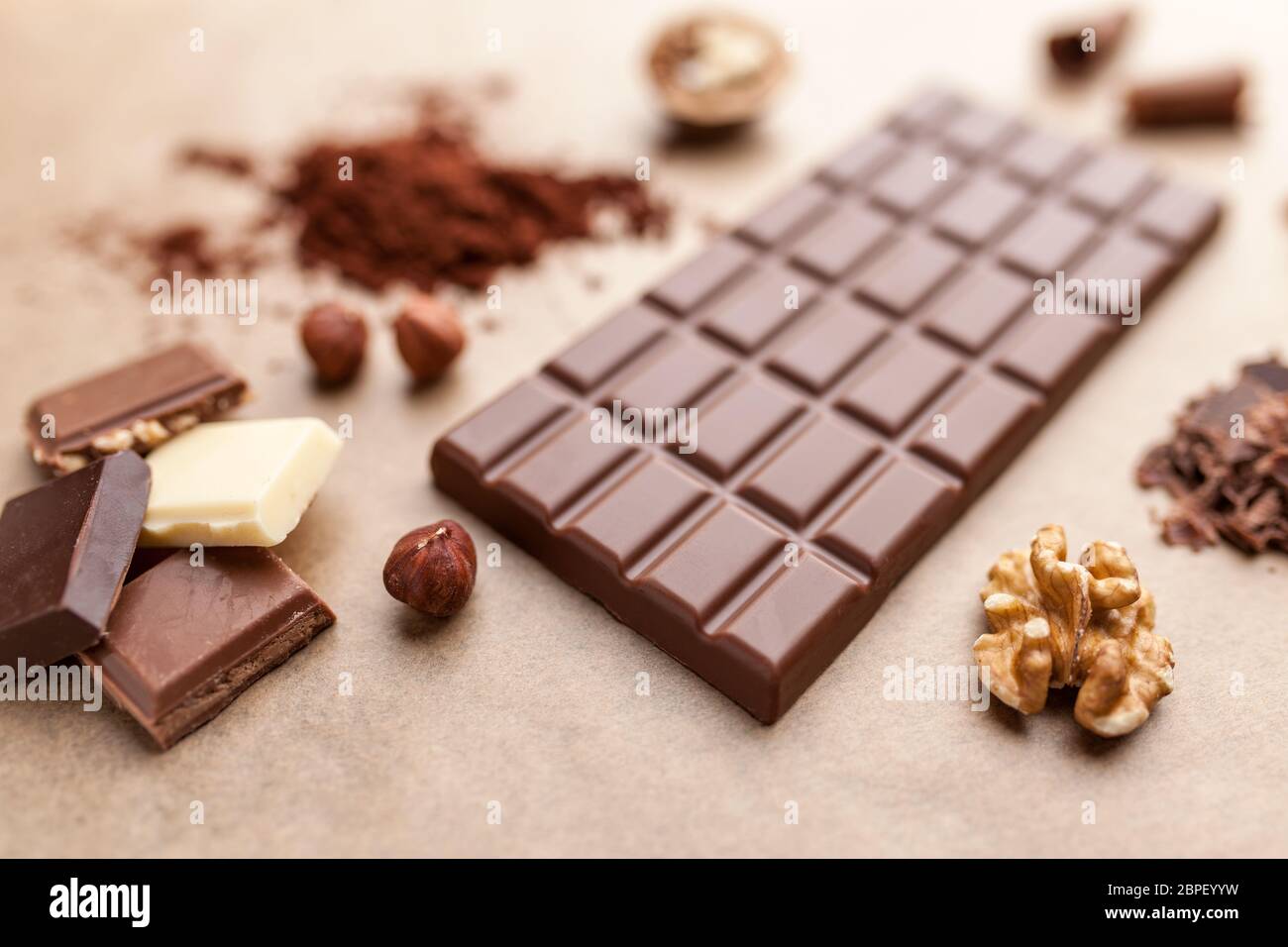Delicious sweet chocolate bar and ingredients Stock Photo - Alamy
