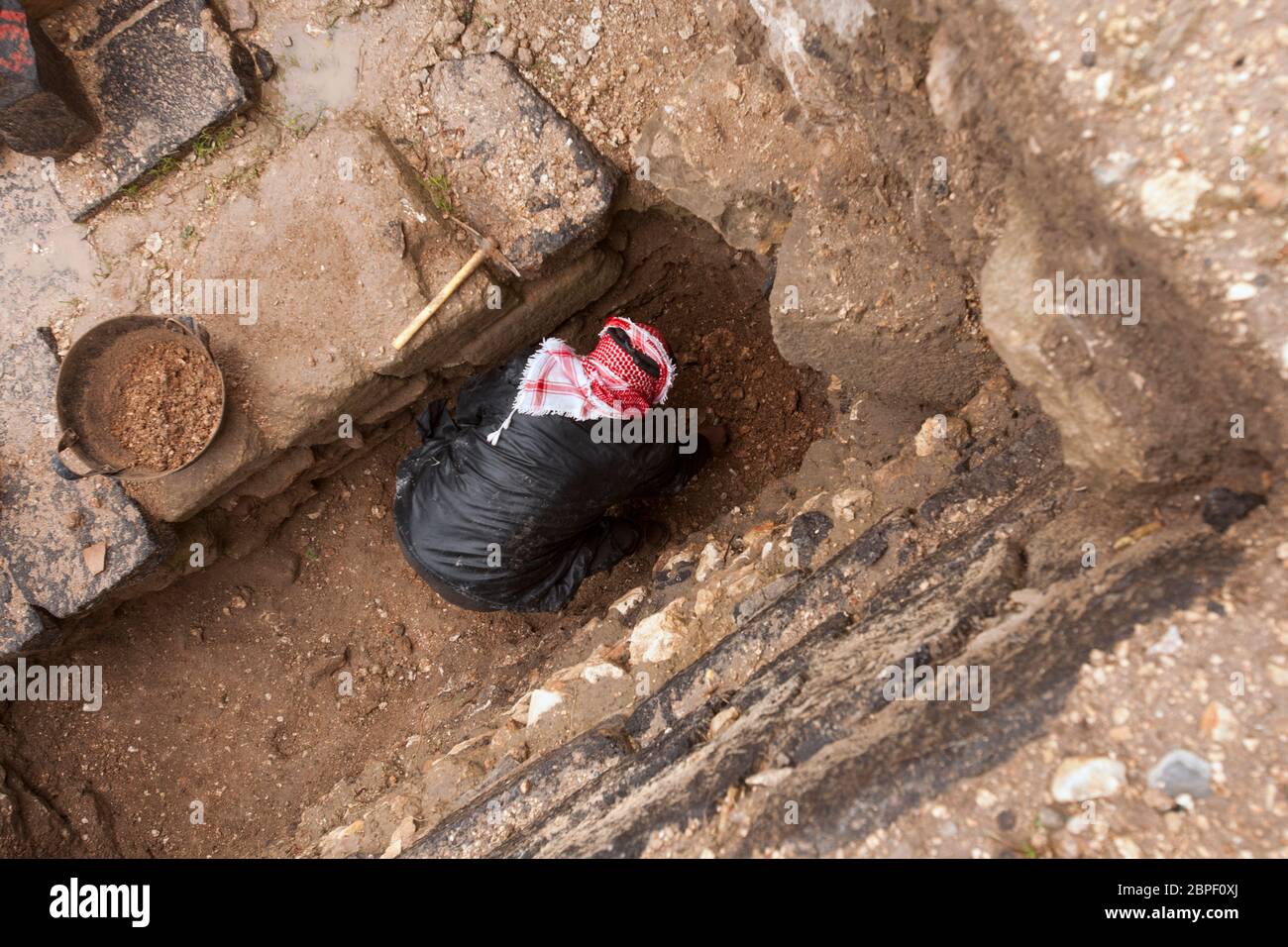 A Jordanian man wearing red and white checked shemagh keffiyeh headdres ...