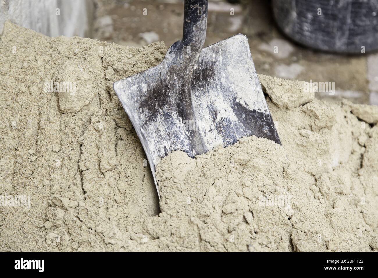 Shovel and sand, construction tool detail, hard craft Stock Photo - Alamy