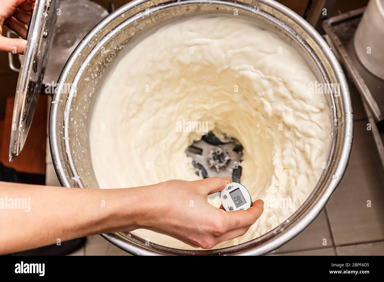 Fresh Butter production in dairy Stock Photo - Alamy