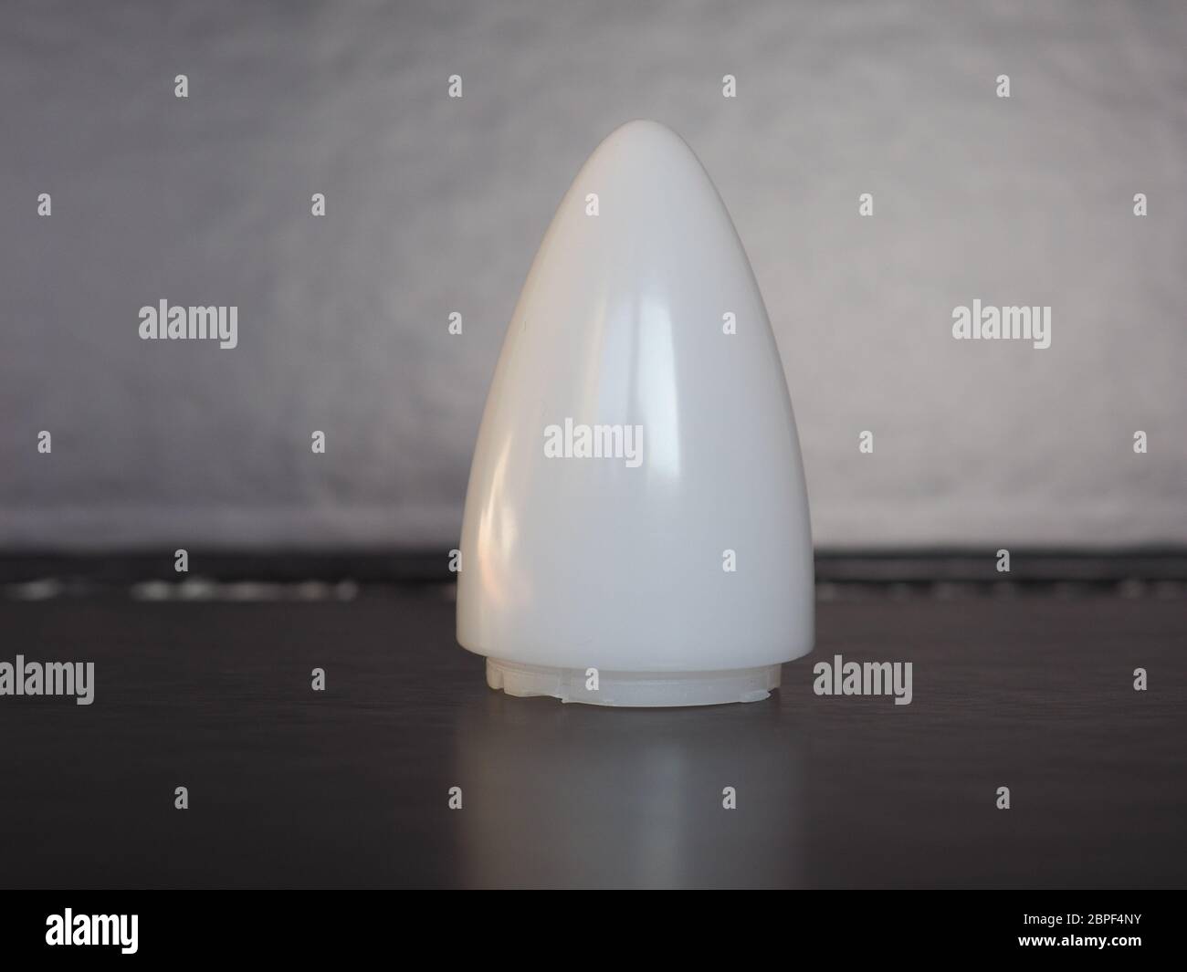 translucent diffusing plastic cover of a led light bulb Stock Photo - Alamy