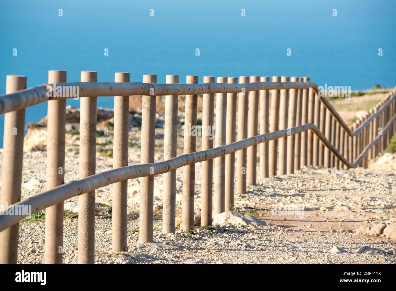 Wooden fence with the sea in the background Stock Photo - Alamy