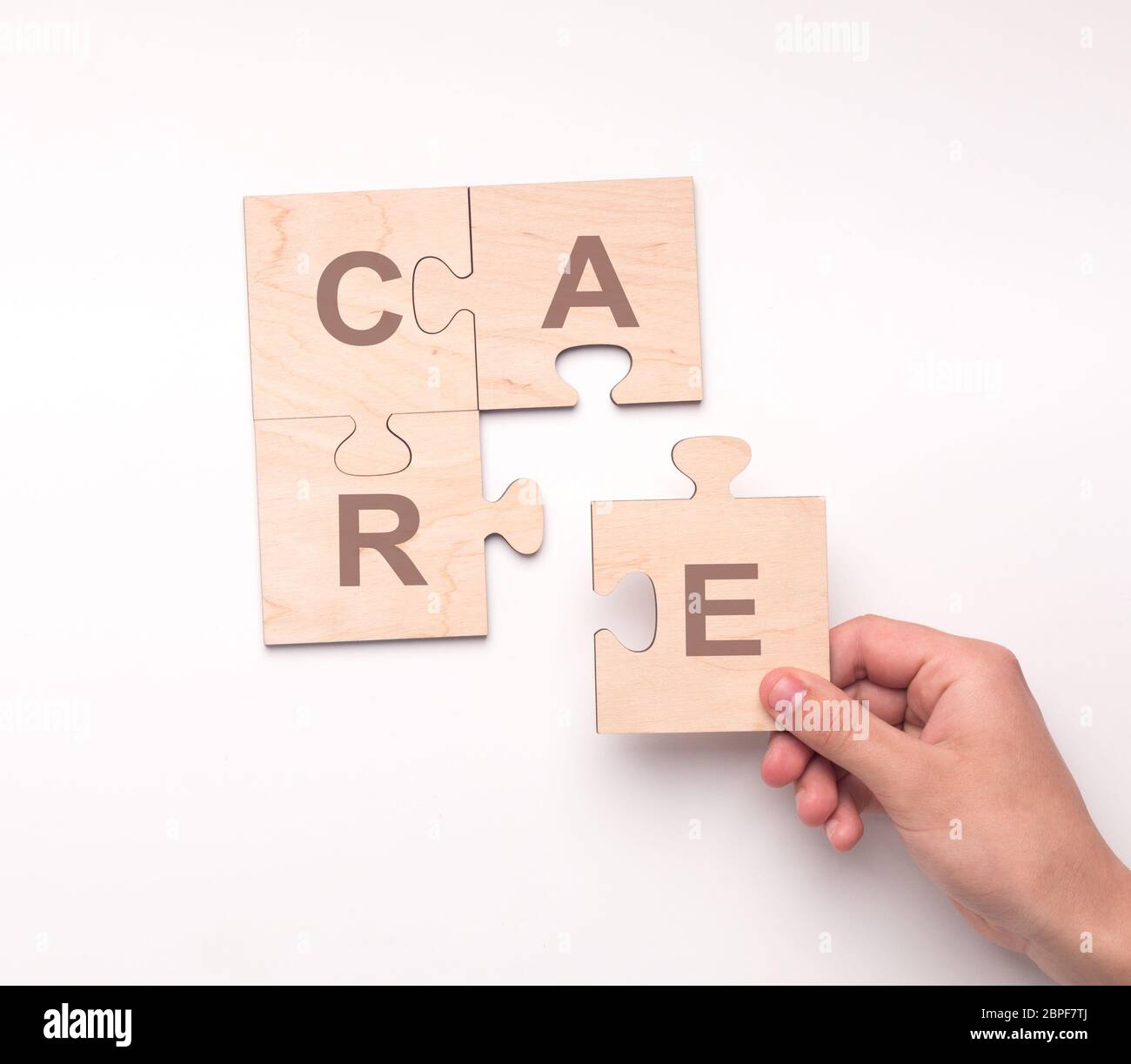 Woman putting together word puzzle hi-res stock photography and images ...