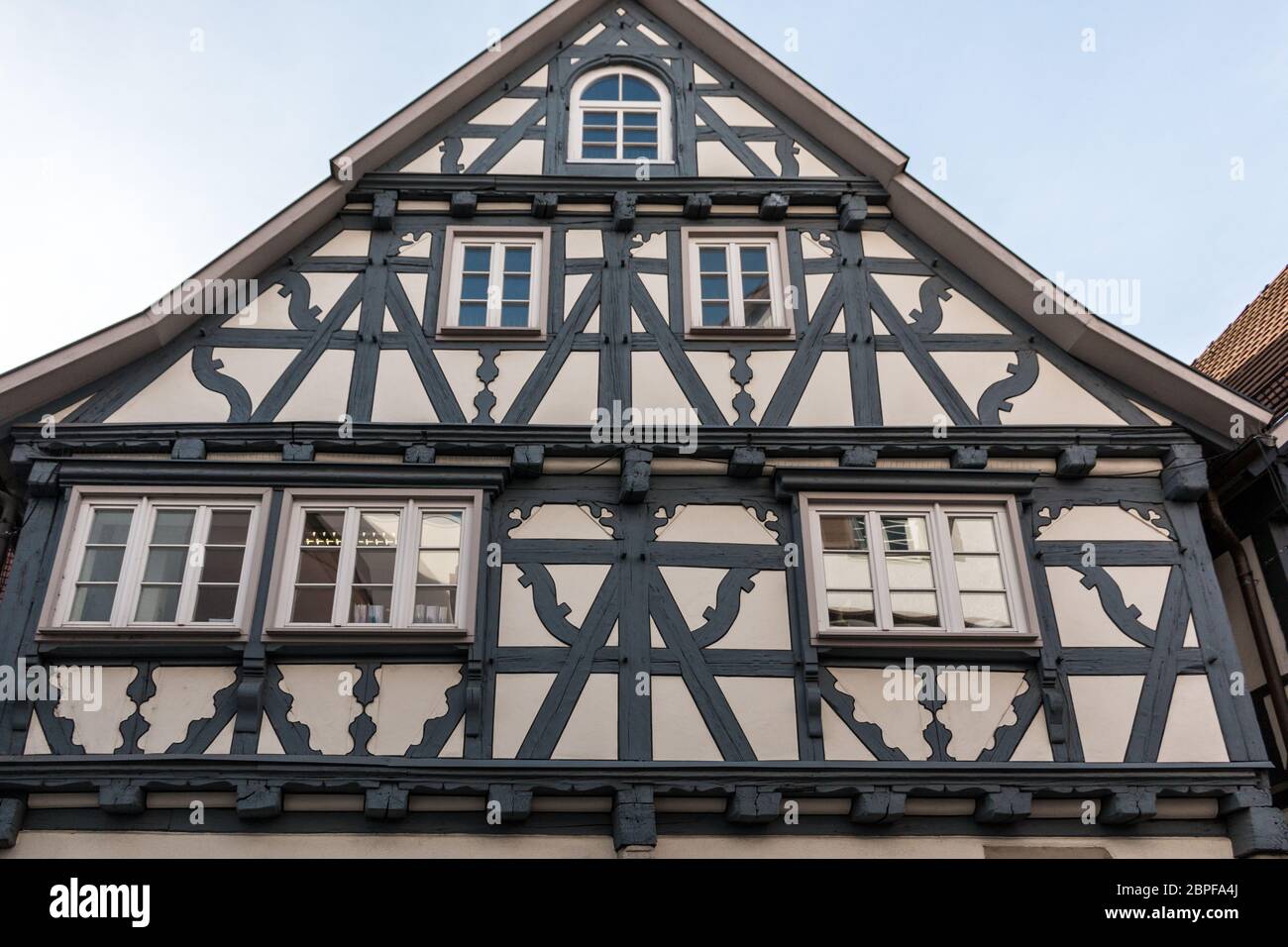 Old historical building and half-timber house with blue or gray wood ...