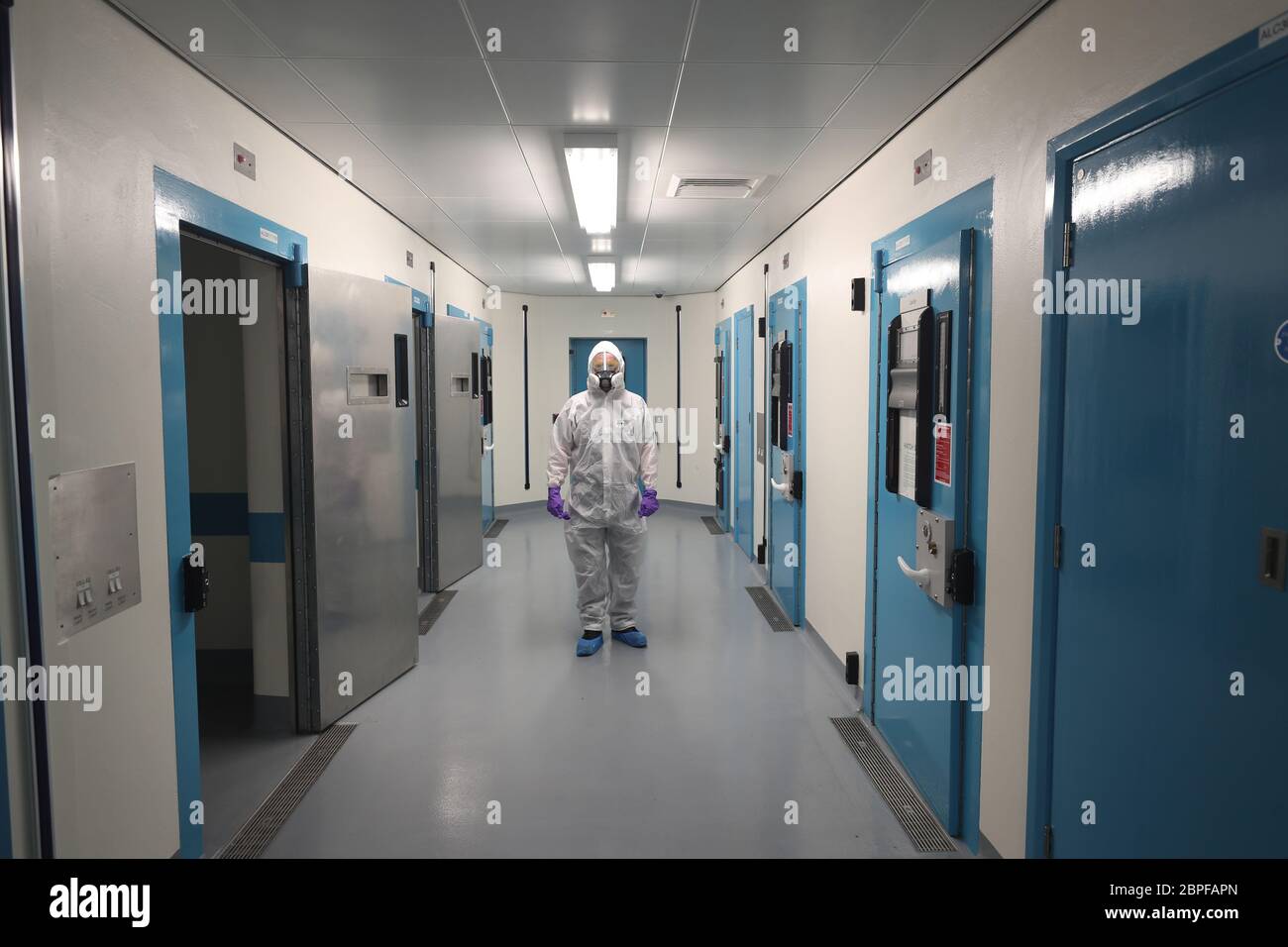 A member of the PSNI Musgrave Street custody team wearing the PPE ...