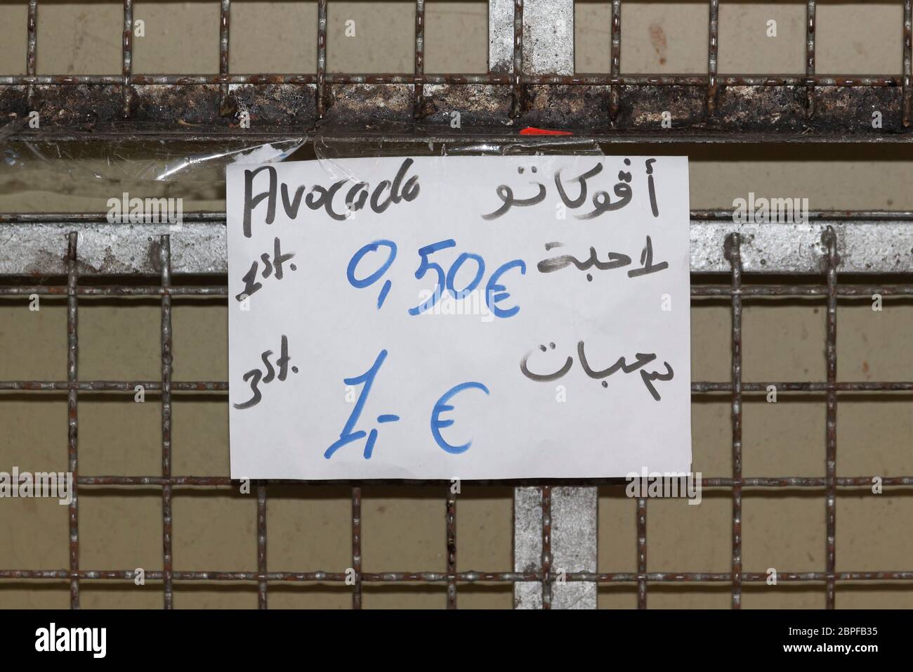 Handwritten price tag at an Arabian fruit and vegetable shop Stock ...