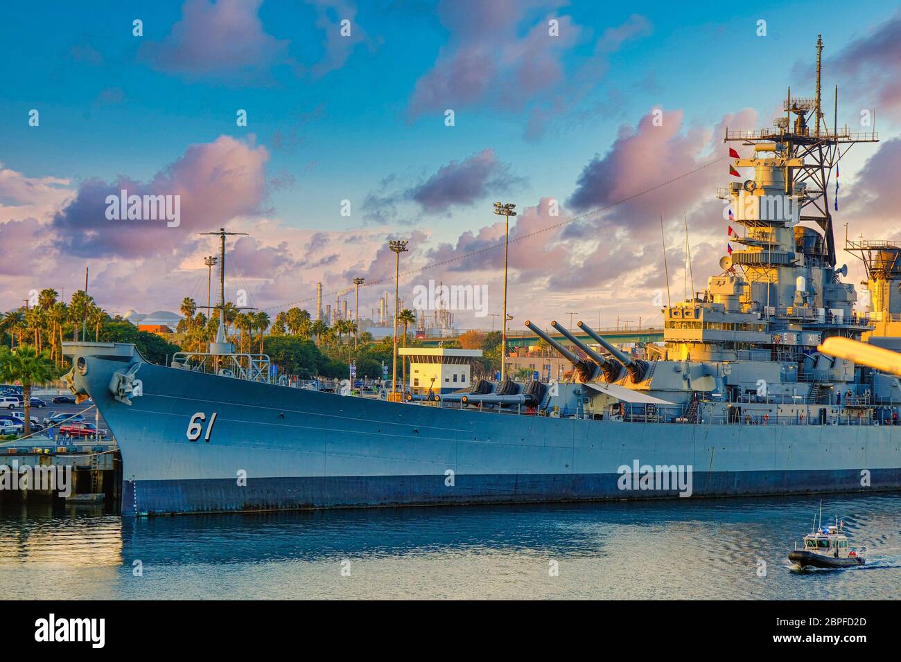 Police Boat and Battleship Stock Photo - Alamy