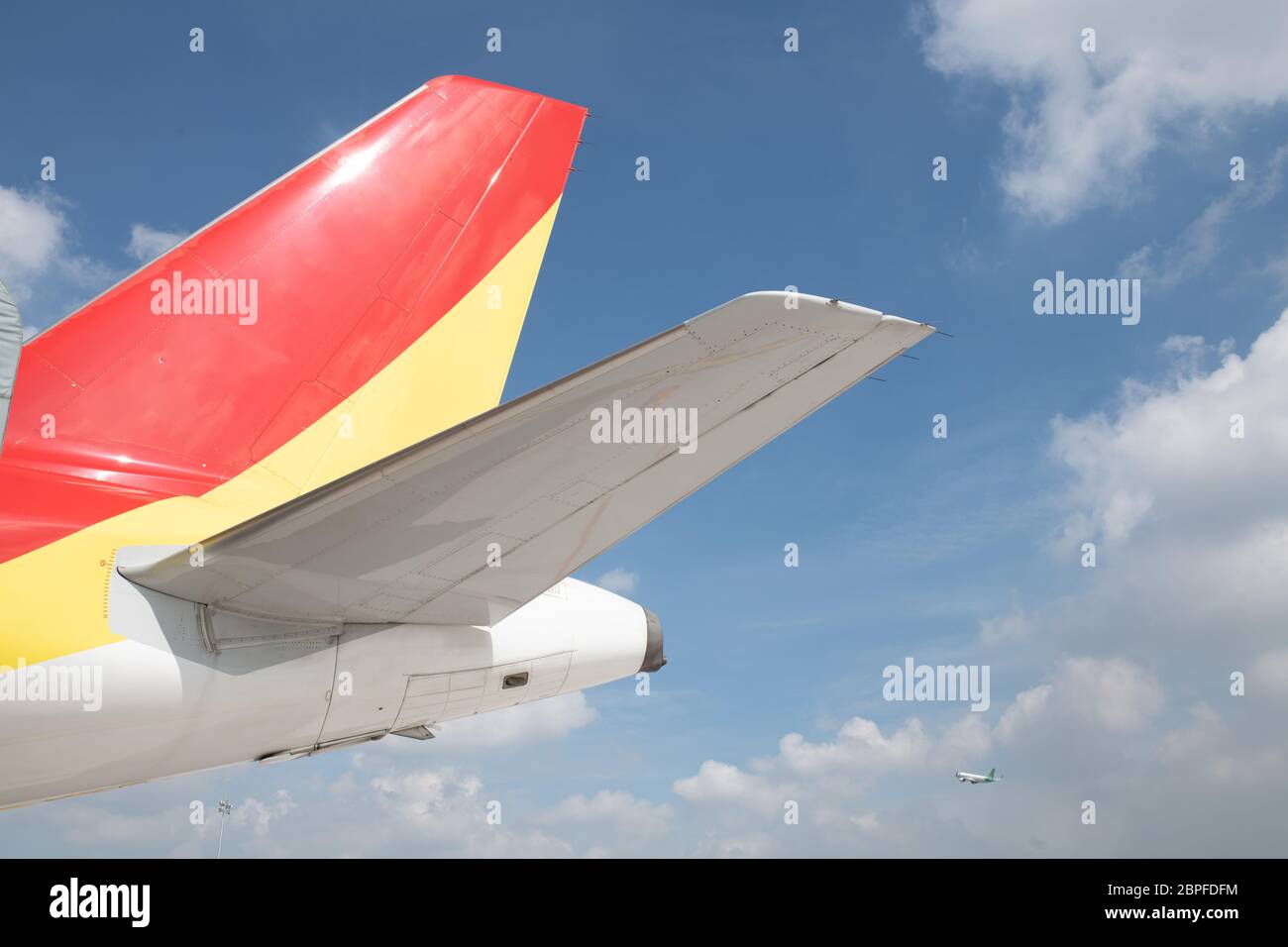 Airplane tail on blue sky background close-up Stock Photo - Alamy