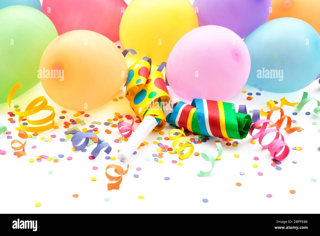 Noisemakers, streamers and confetti. Isolated on white background Stock ...