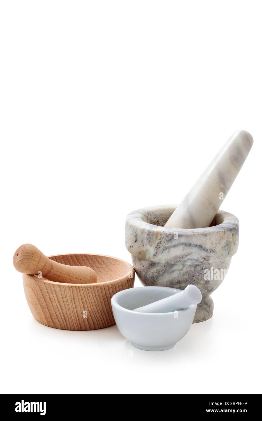 Wooden, porcelain and marble mortars isolated on white background Stock ...