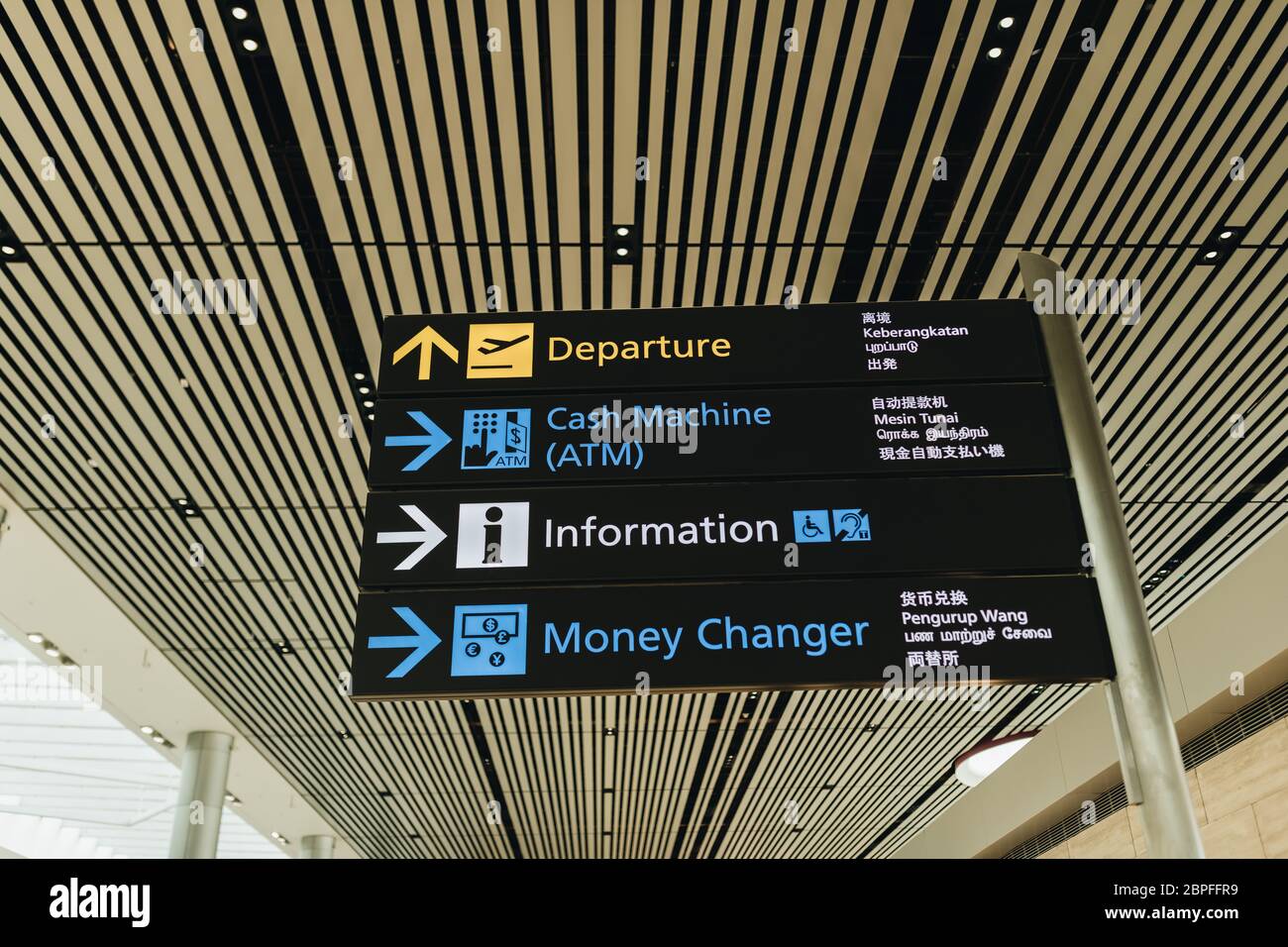 Guidance sign in an airport terminal Stock Photo - Alamy