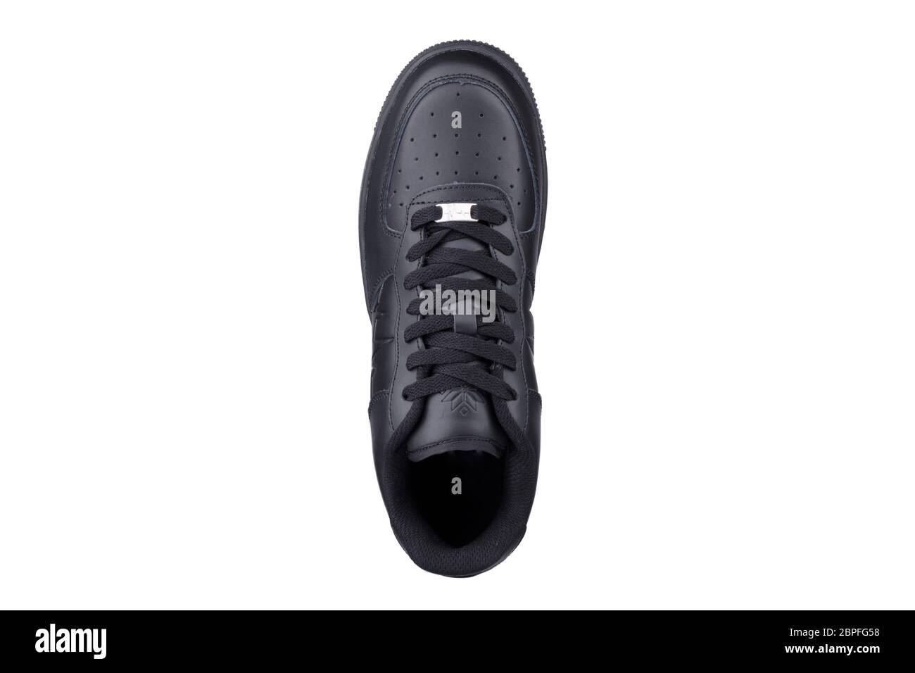 One black sneaker on a white background. Sport shoes Stock Photo - Alamy