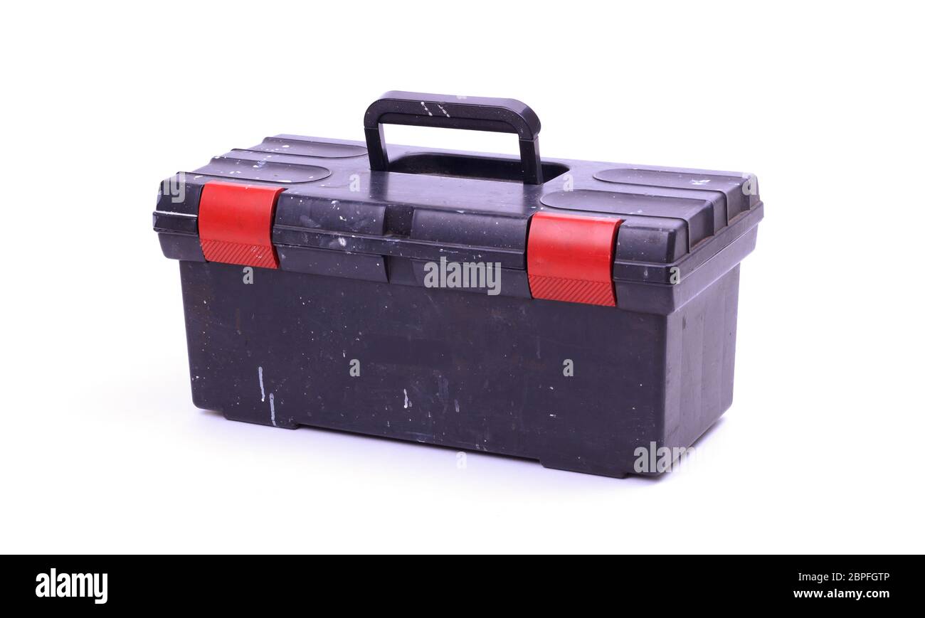 Old dirty black toolbox, isolated on white Stock Photo - Alamy