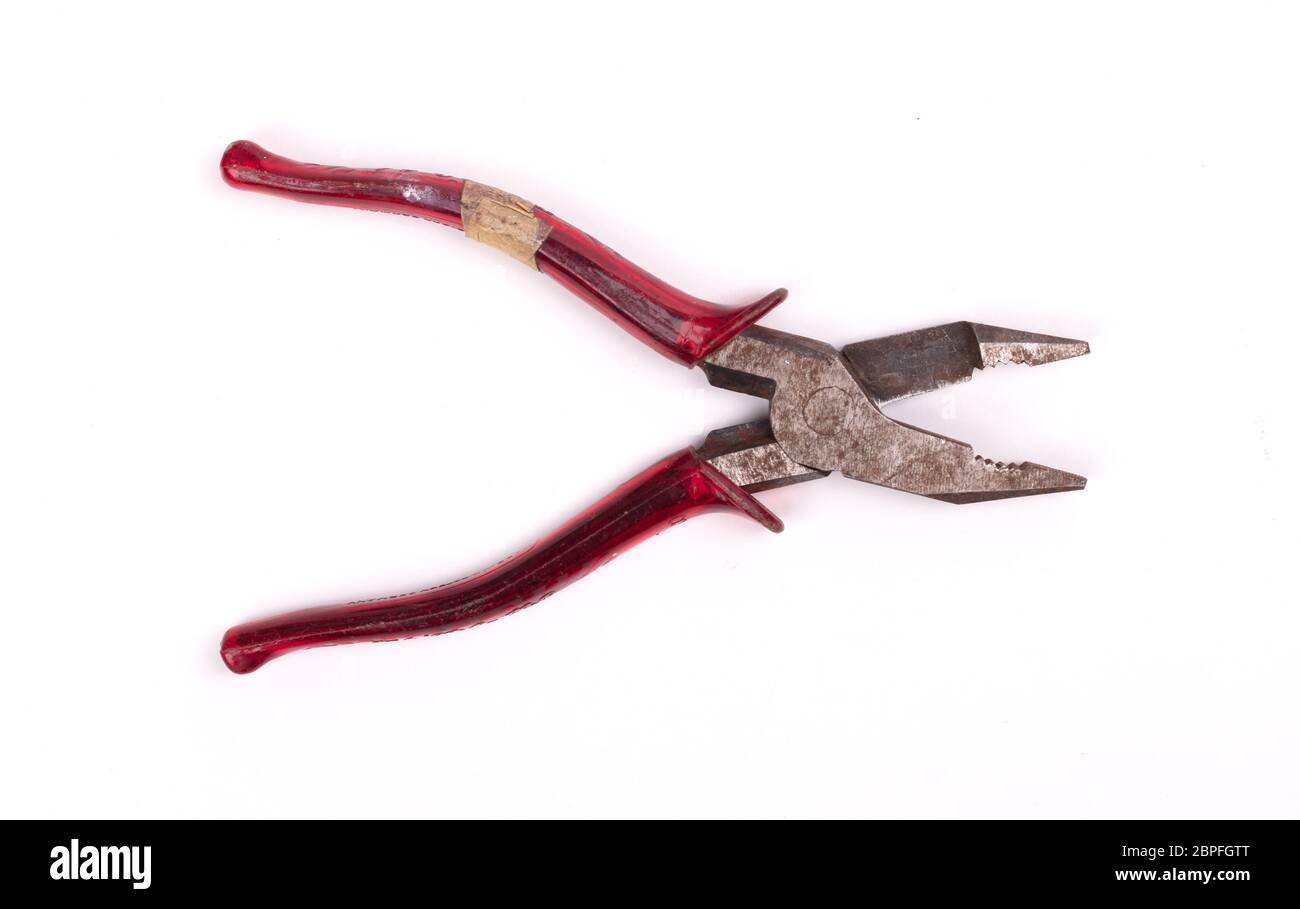 Old red pliers, isolated on a white background Stock Photo - Alamy