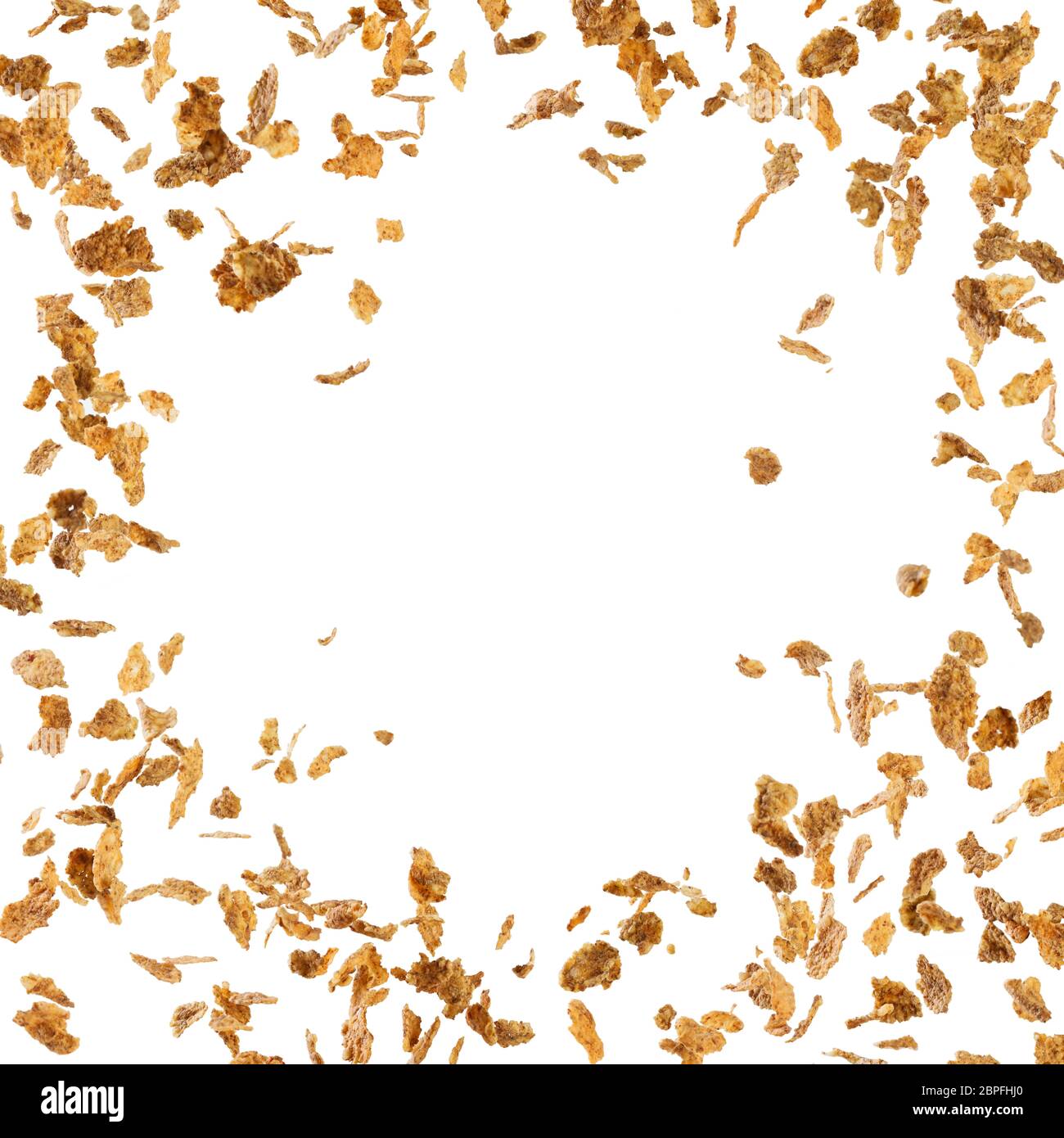 Falling corn flakes isolated on white background Stock Photo - Alamy