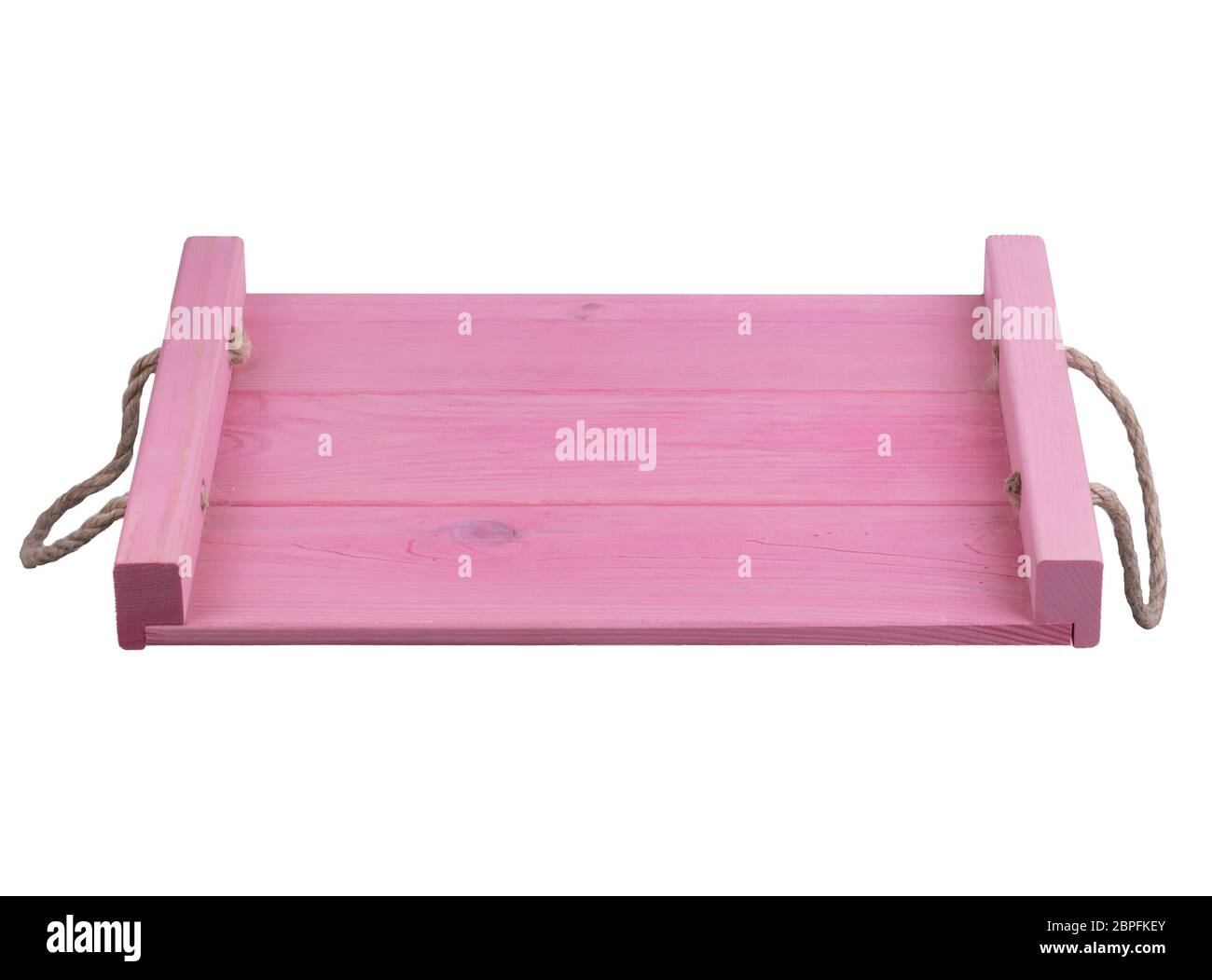 Wooden pink tray on a white background Stock Photo - Alamy