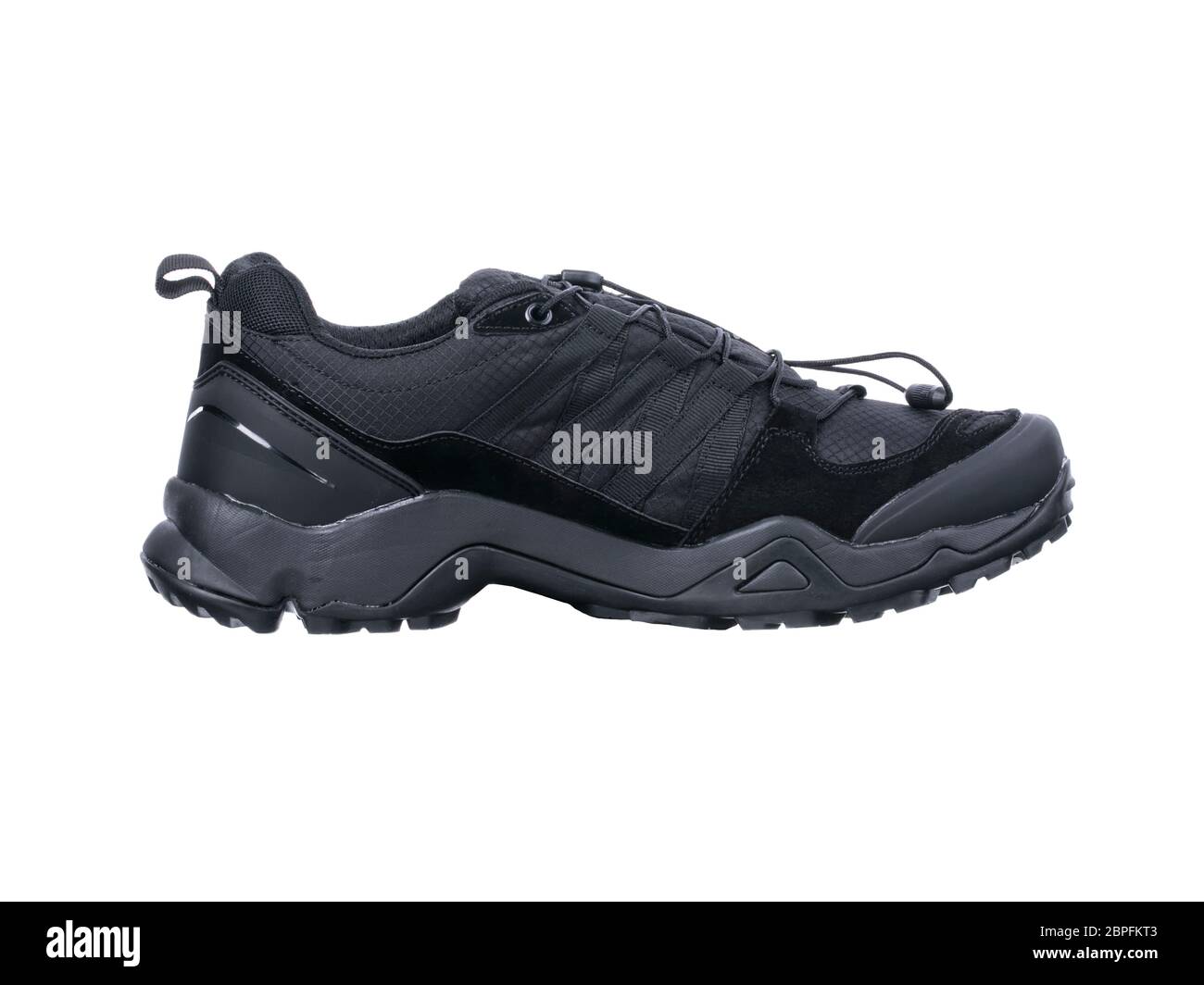 Black sneaker side view on a white background Stock Photo - Alamy