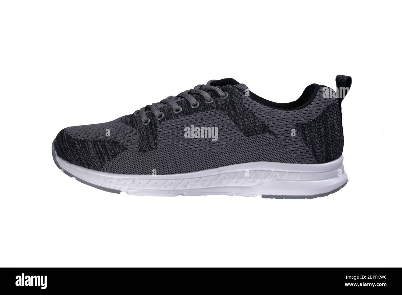 Sport shoes. Side view of a gray sneaker made of fabric with dark ...
