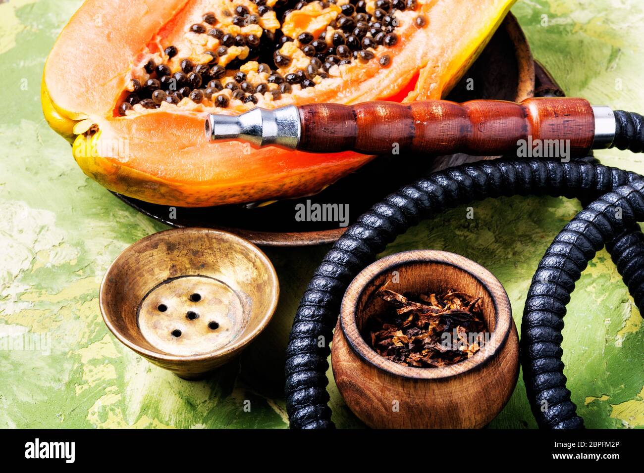 Oriental exotic hookah with papaya fruit flavor.Smoking Turkish shisha ...