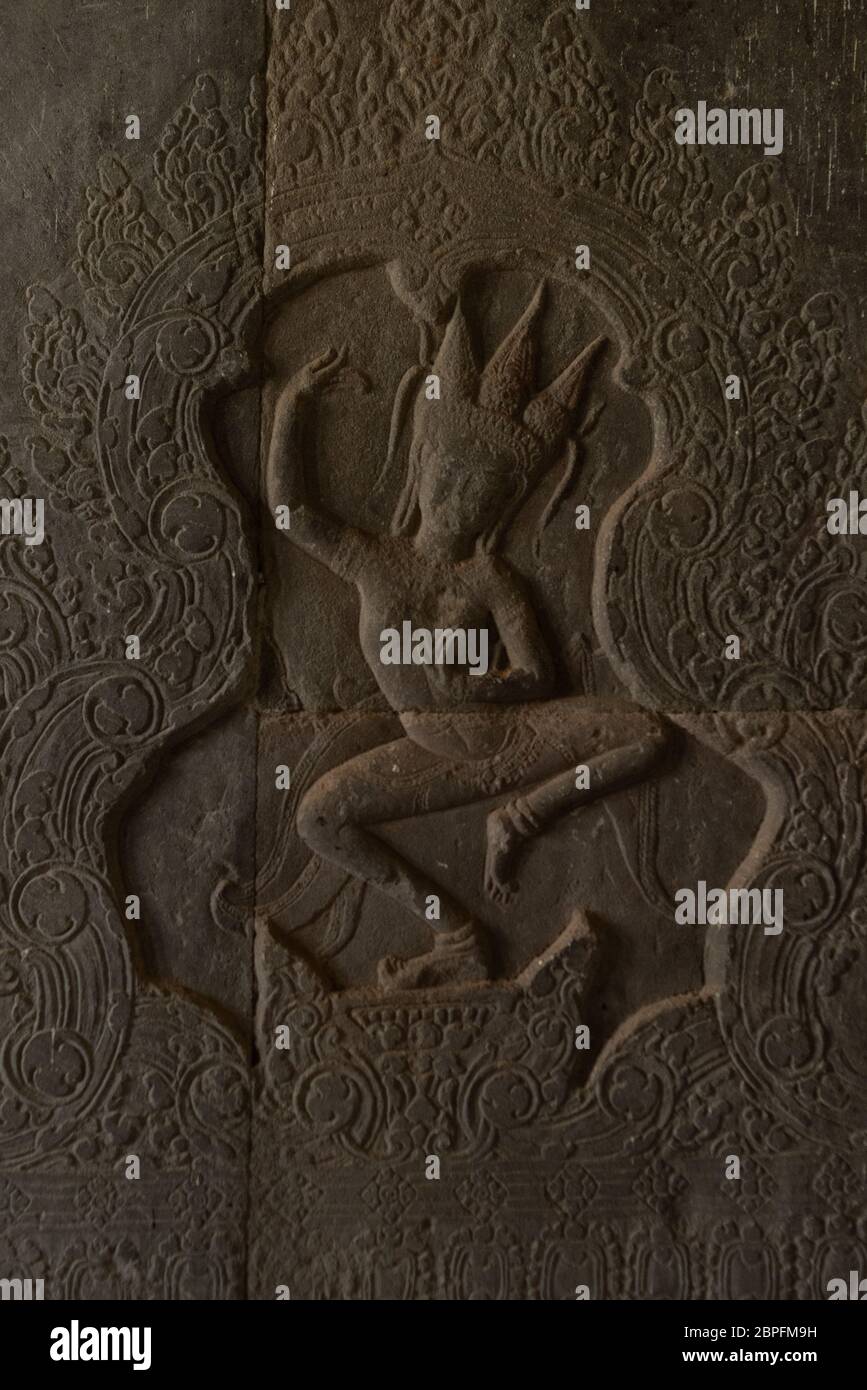 Bas-relief of dancing woman in Angkor Wat Stock Photo - Alamy