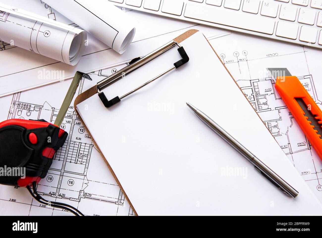 Architect workplace top view. Architectural project, blueprints ...