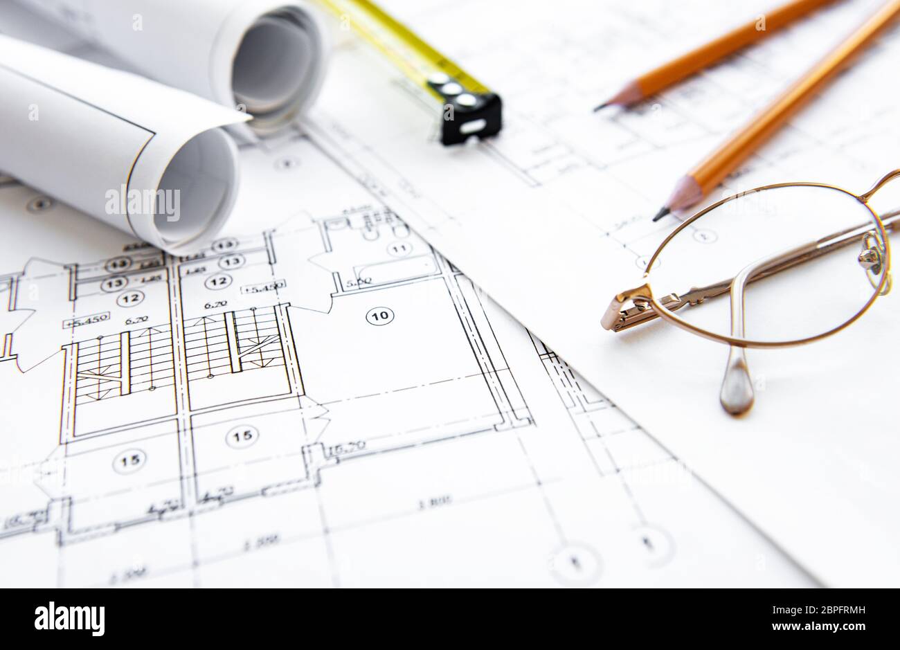 Architect workplace top view. Architectural project, blueprints ...
