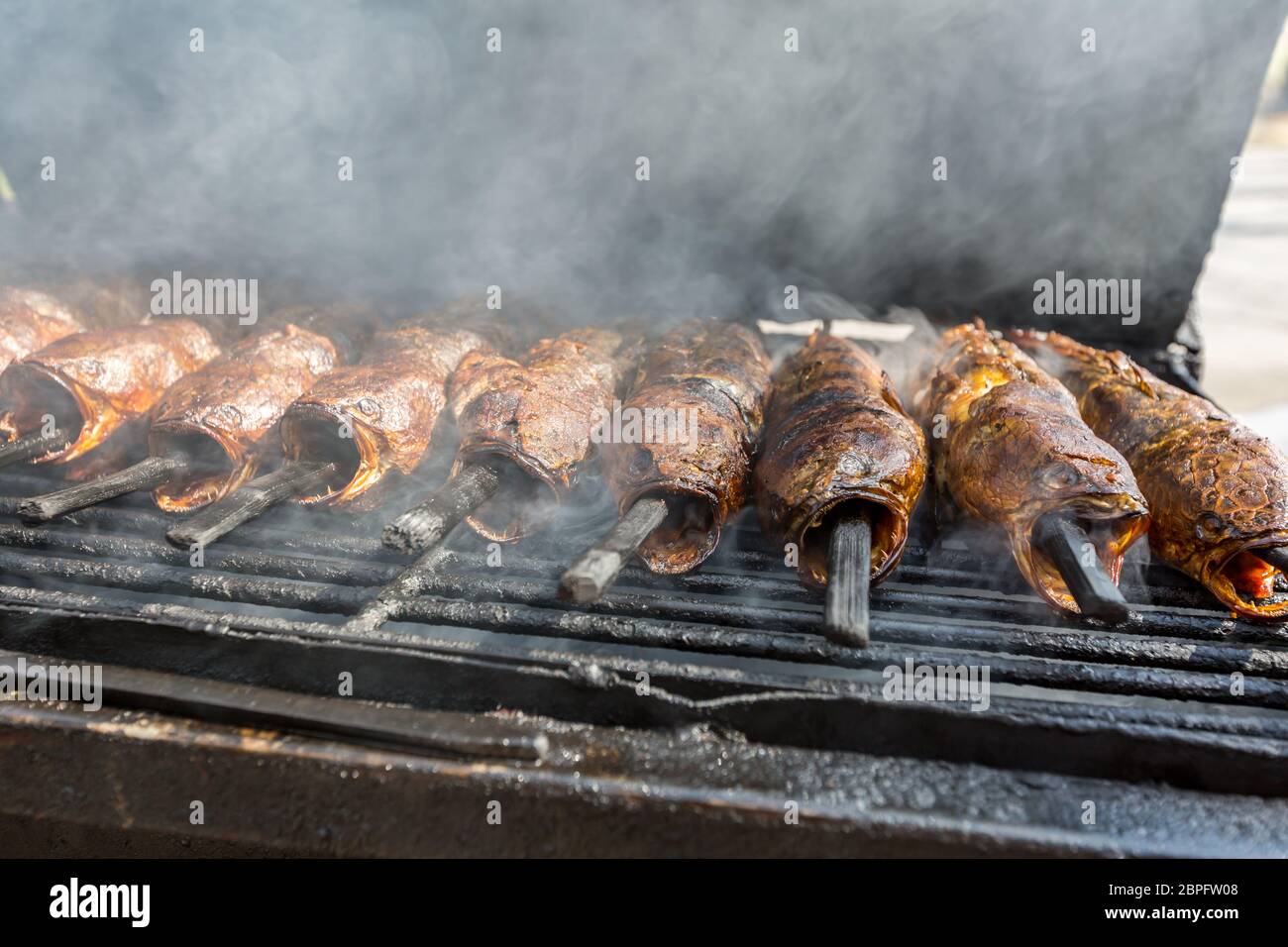 Grilled Snakehead fish Thai style food Stock Photo - Alamy