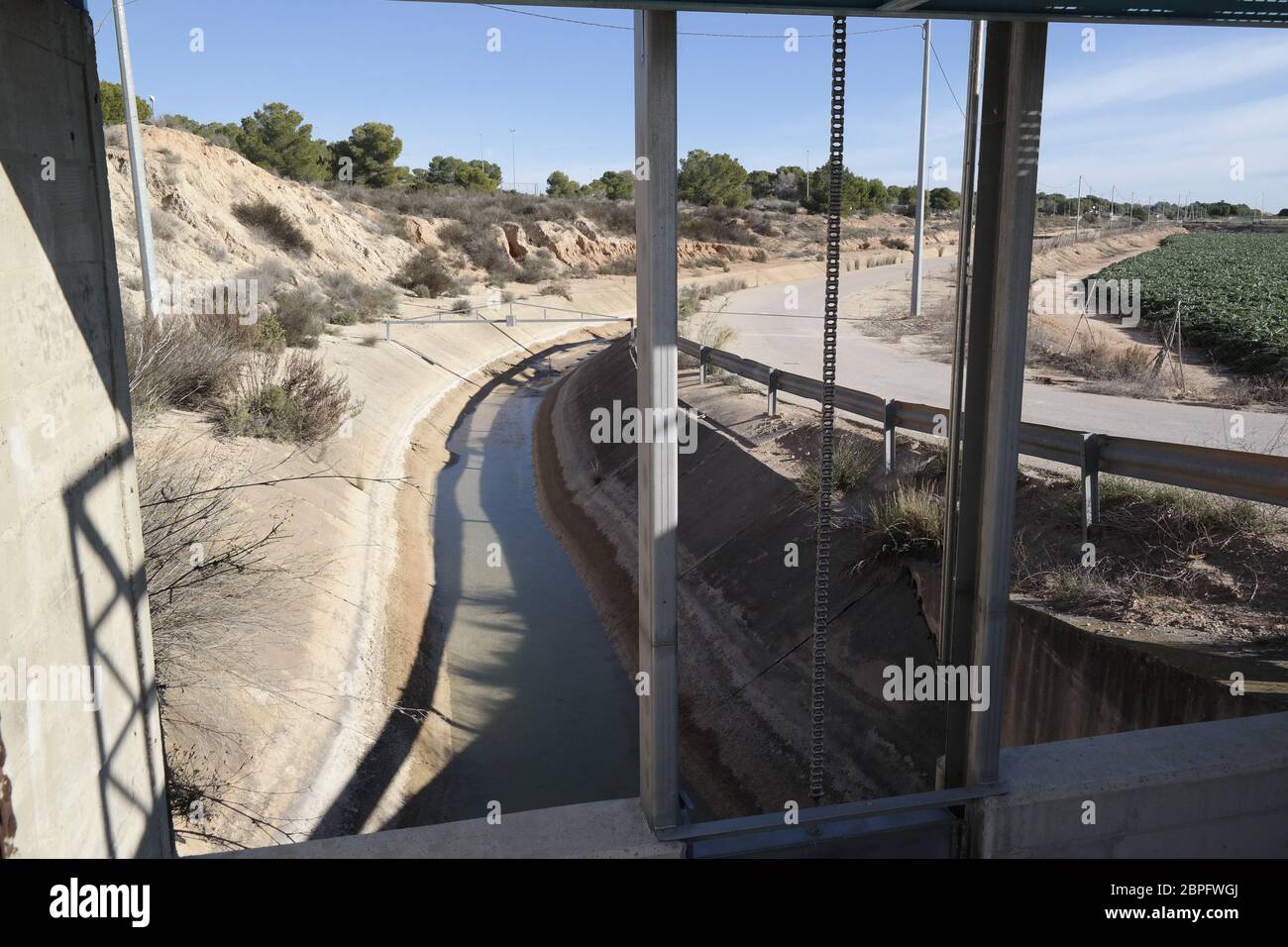 Sluice gate on small Aquaduct in Spain Stock Photo - Alamy