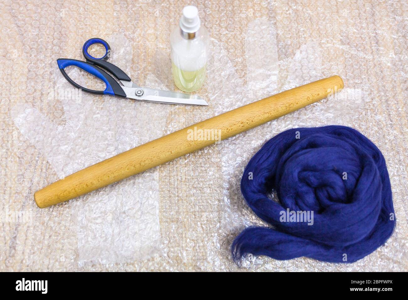 workshop of hand making a fleece gloves from Merino sheep wool using ...