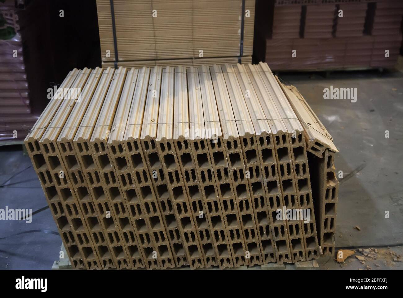 Heap of bricks in industrial factory, material work Stock Photo - Alamy
